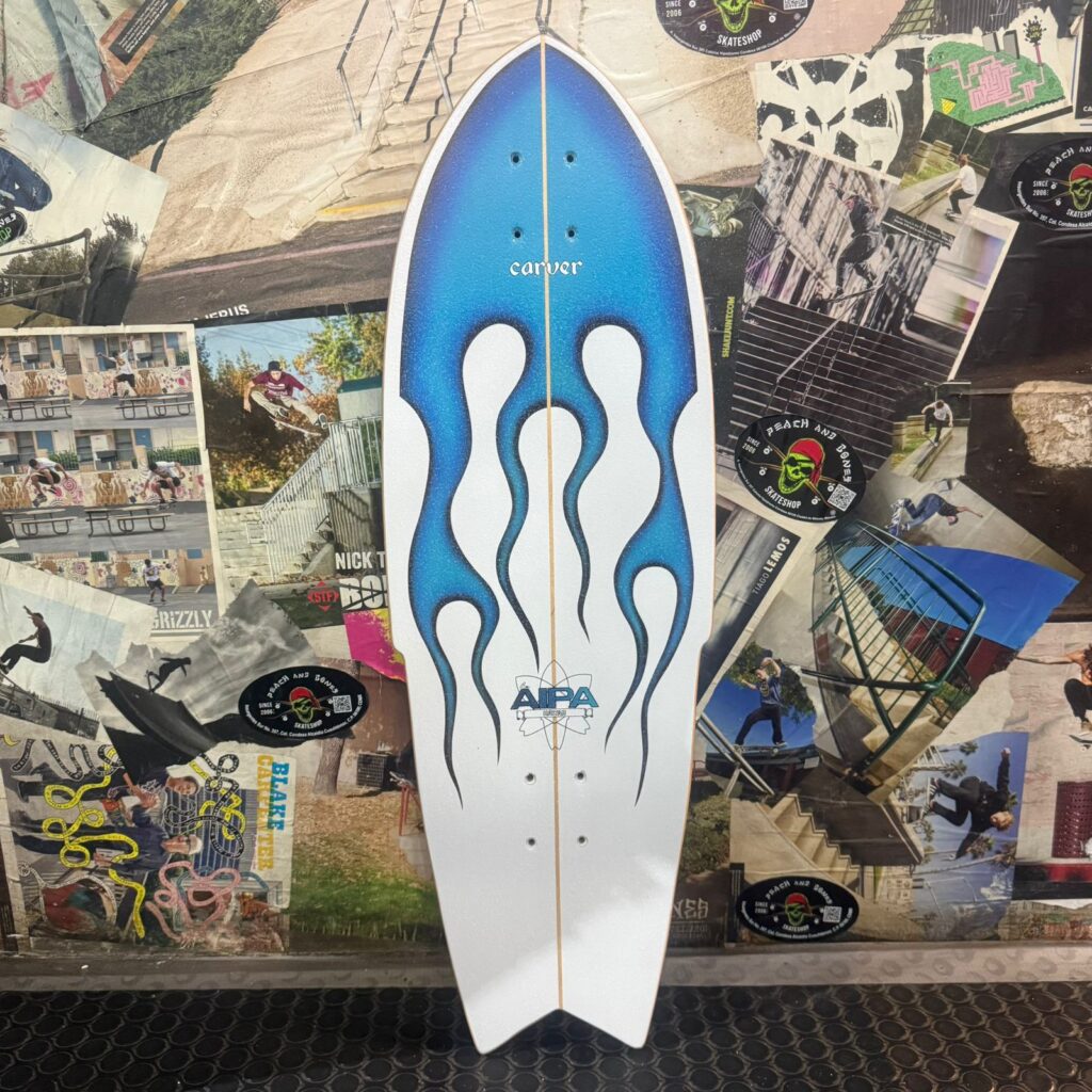 Surfskate Carver Deck Aipa Sting - Peach and Bones Skateshop CDMX